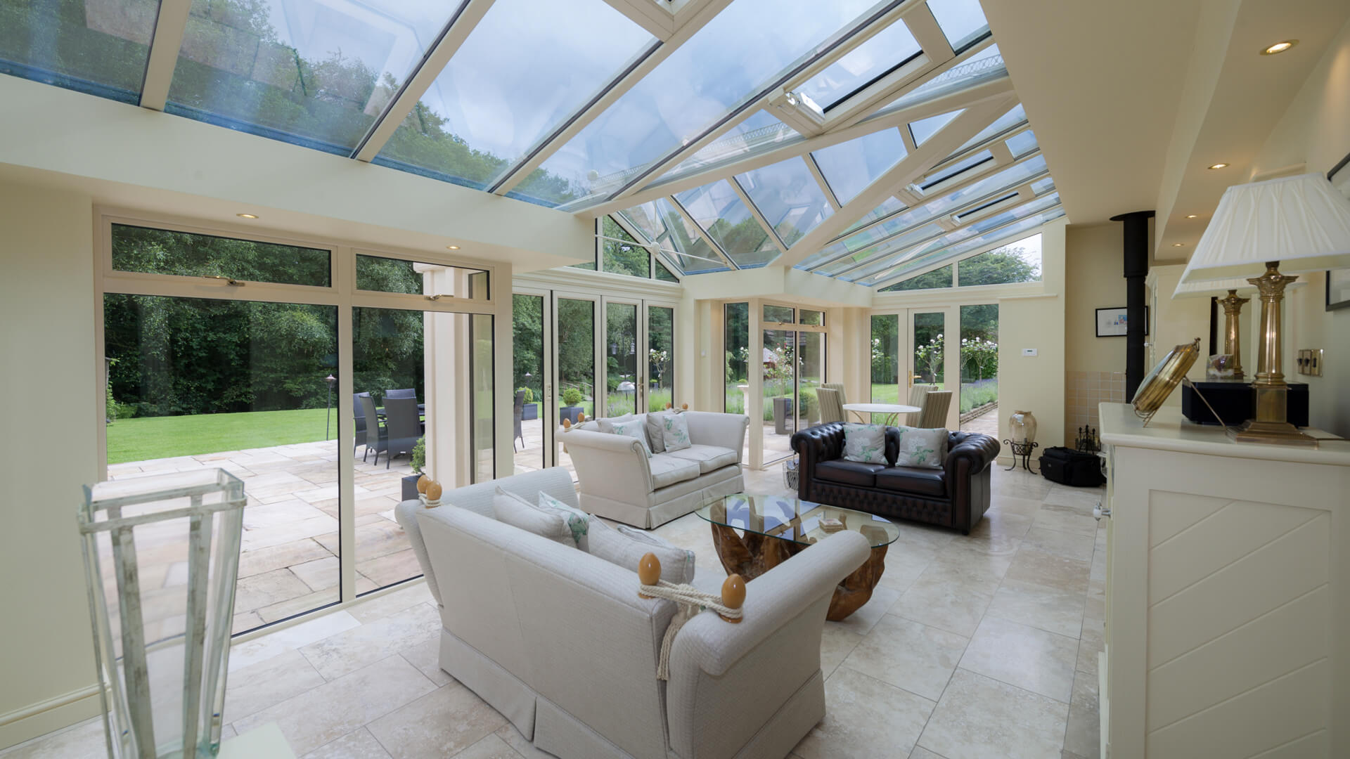 T-Shaped Conservatory finished in Cream Aluminium by Hazlemere