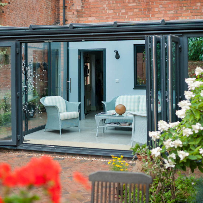Modern Lean-To UPVC Conservatory with Bi-Folding Doors by Hazlemere
