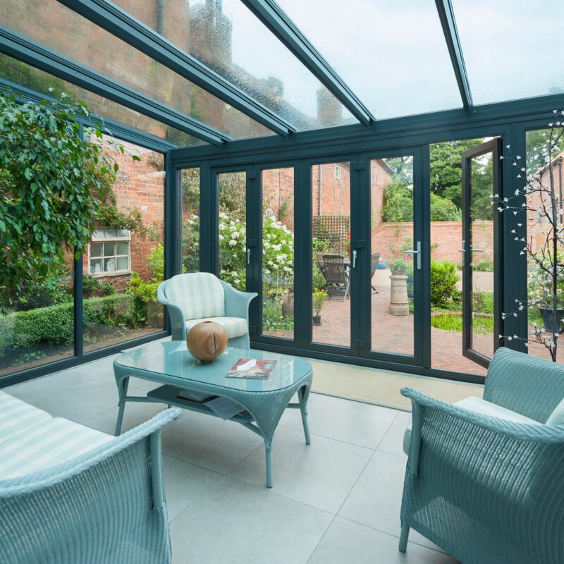 Modern Lean-To UPVC Conservatory with Bi-Folding Doors by Hazlemere