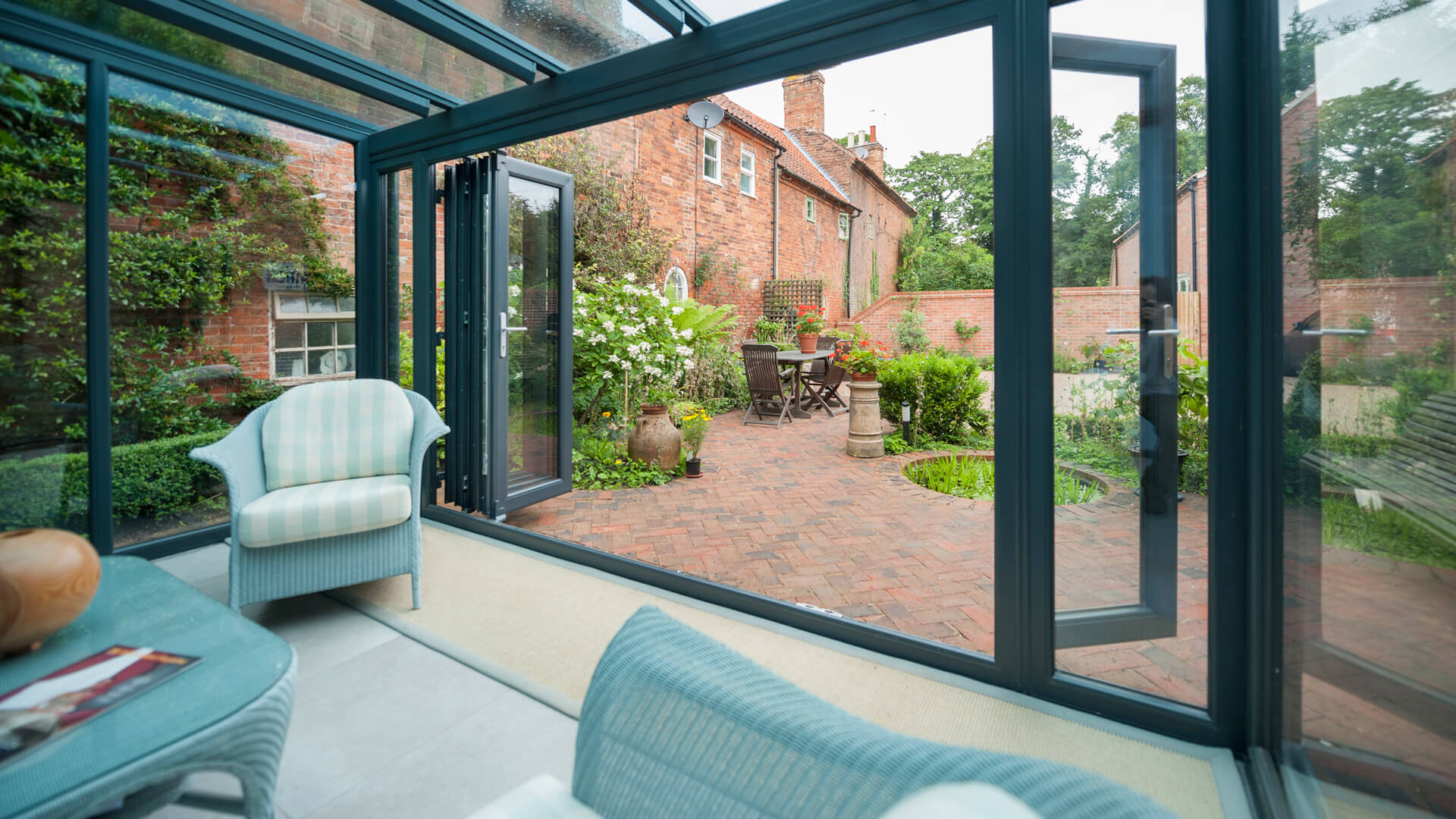 Modern Lean-To UPVC Conservatory with Bi-Folding Doors by Hazlemere